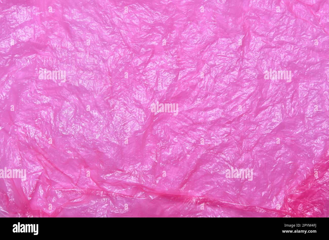 Crumpled pink plastic bag texture. Polypropylene recyclable packaging ...