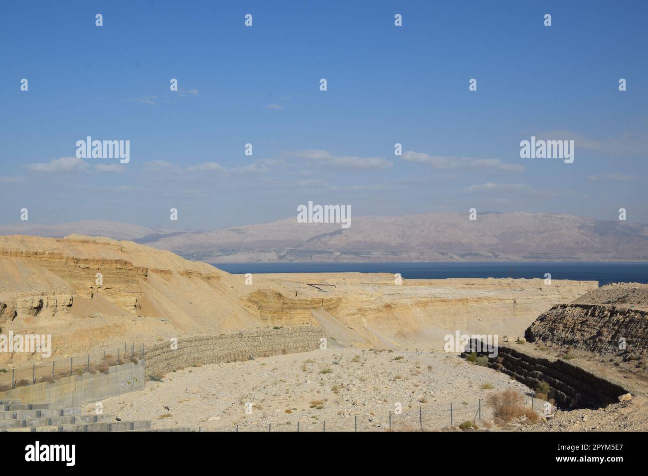 Empty riverbed - Receding sea level and dried out coastline of the Dead ...