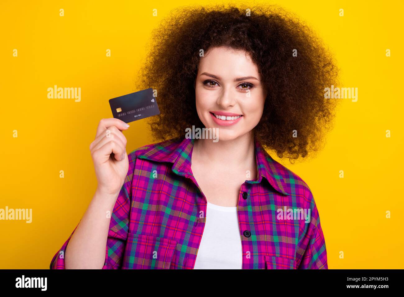 Photo of sweet adorable lady wear checkered jacket rising credit card ...