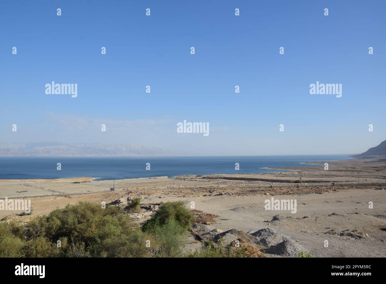 Receding sea level and dried out coastline of the Dead Sea: Driving ...
