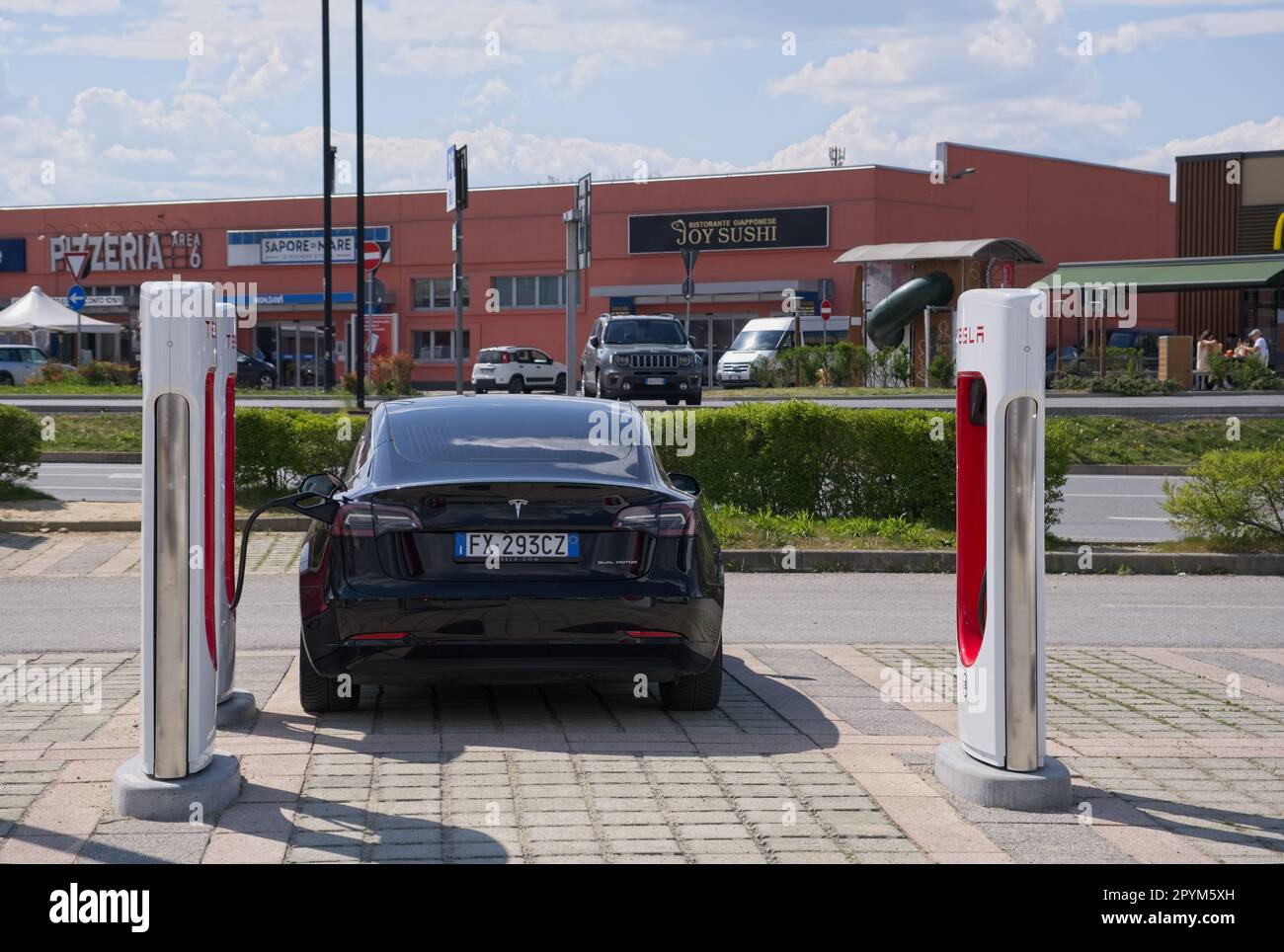 Mondovi, Italy - April 18, 2023: A static shot of a solid black Tesla ...