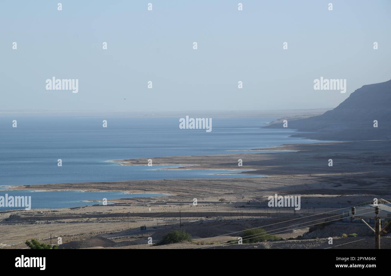 Receding sea level and dried out coastline of the Dead Sea: Driving ...