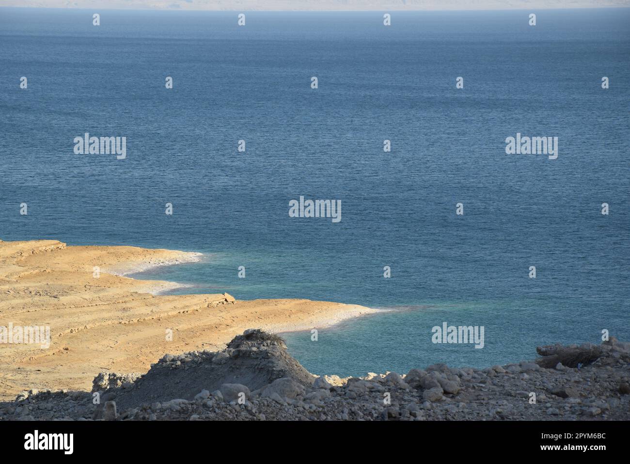 Receding sea level and dried out coastline of the Dead Sea: Driving ...