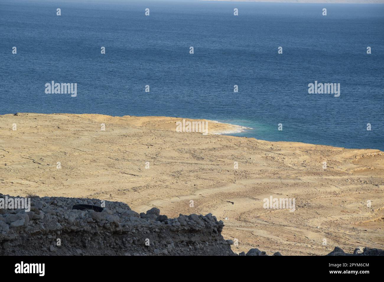 Receding sea level and dried out coastline of the Dead Sea: Driving ...