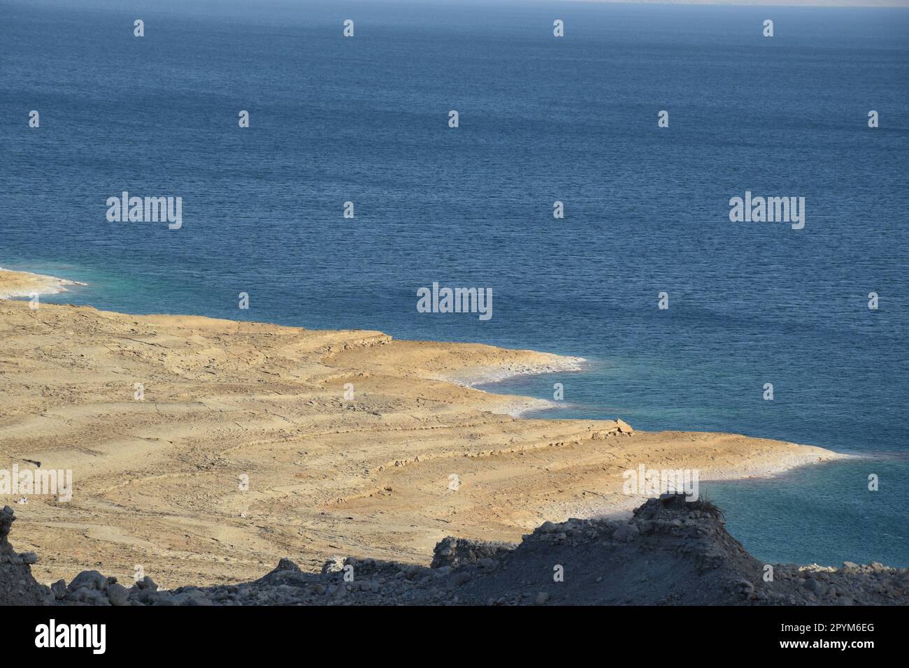 Receding sea level and dried out coastline of the Dead Sea: Driving ...