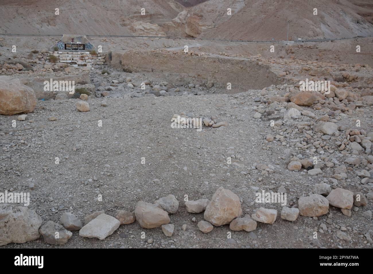 Receding, dried out coastline of the Dead Sea: Driving south on route ...