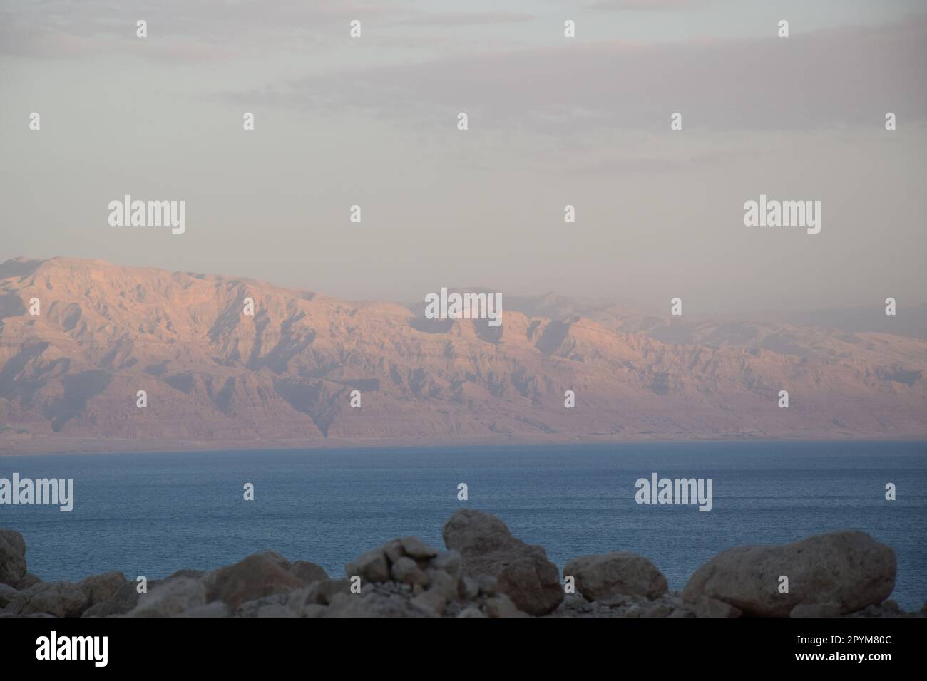 Receding, dried out coastline of the Dead Sea: Driving south on route ...