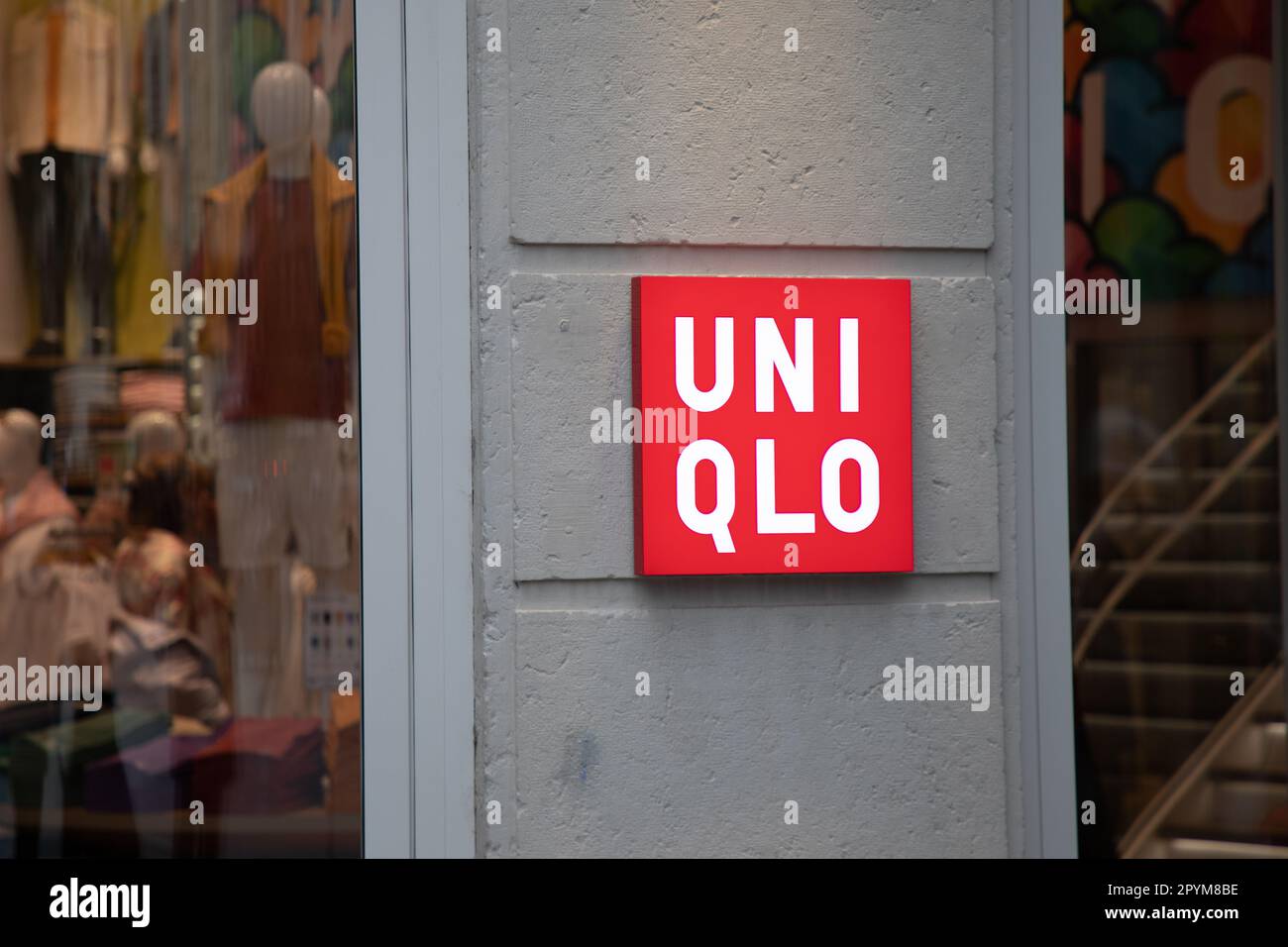 lyon , Aura France - 04 27 2023 : Uniqlo logo brand and text red sign ...