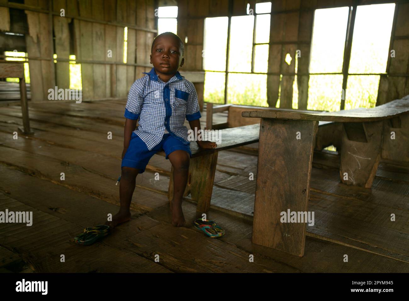 Ondo State, Nigeria - May 2nd, 2023 - A student sitting hopelessly ...