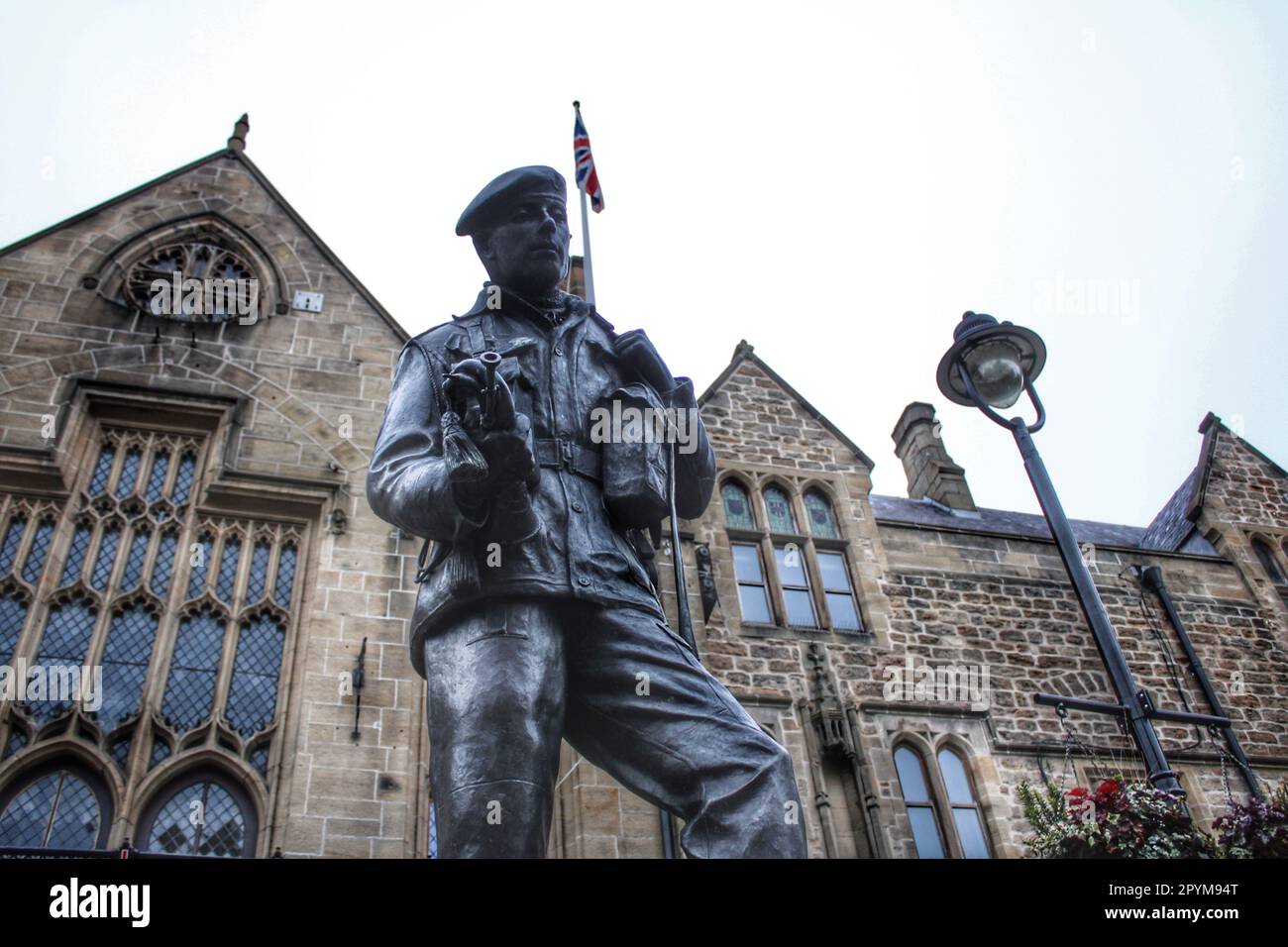 A bronze statue of a soldier in military uniform, depicting the Durham ...