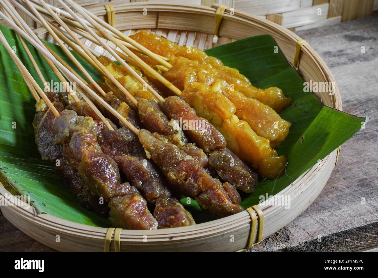 Raw food chicken and beef satay is famous Malaysian and Indonesian ...