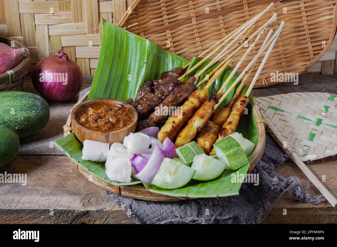 Grilled food chicken and beef satay eaten with peanut sauce is famous ...