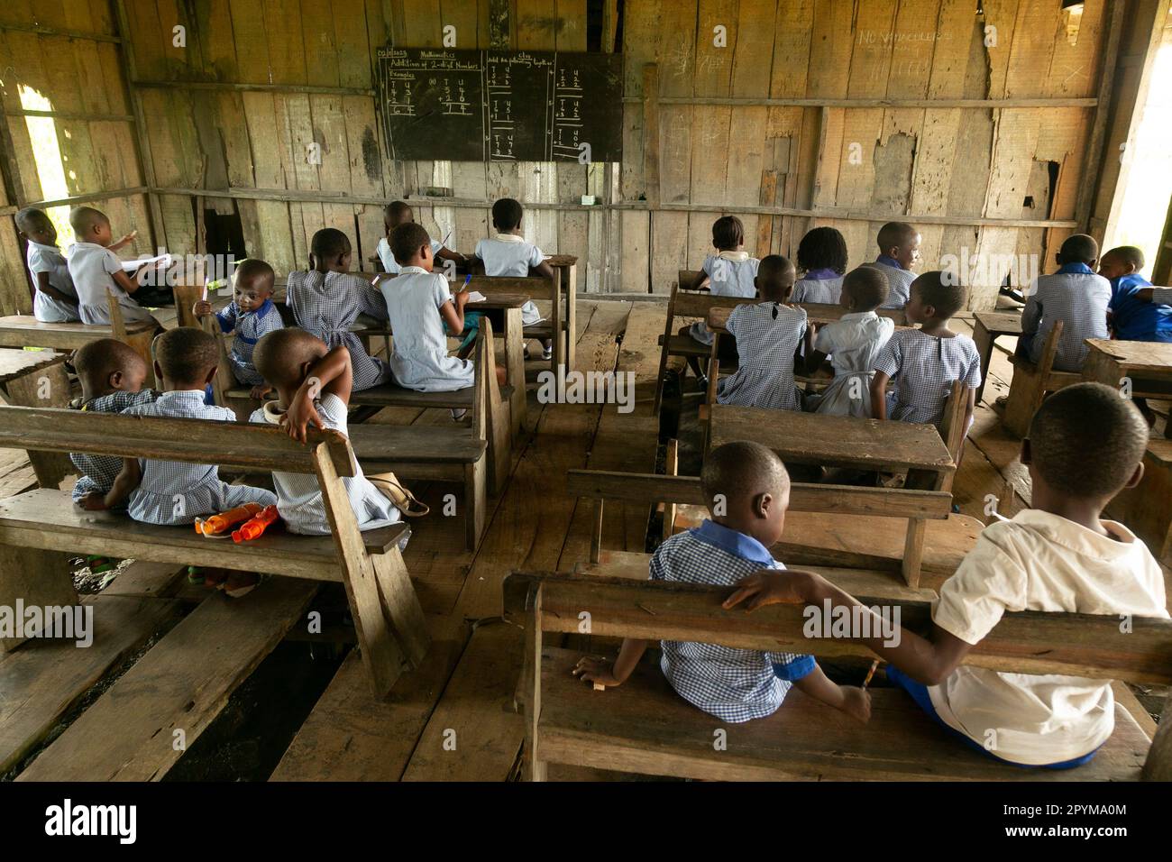Ondo State, Nigeria - May 2nd, 2023 - Student writing in their ...