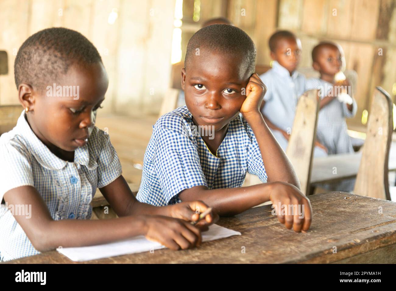 Ondo State, Nigeria - May 2nd, 2023 - A girl looking on inside their ...