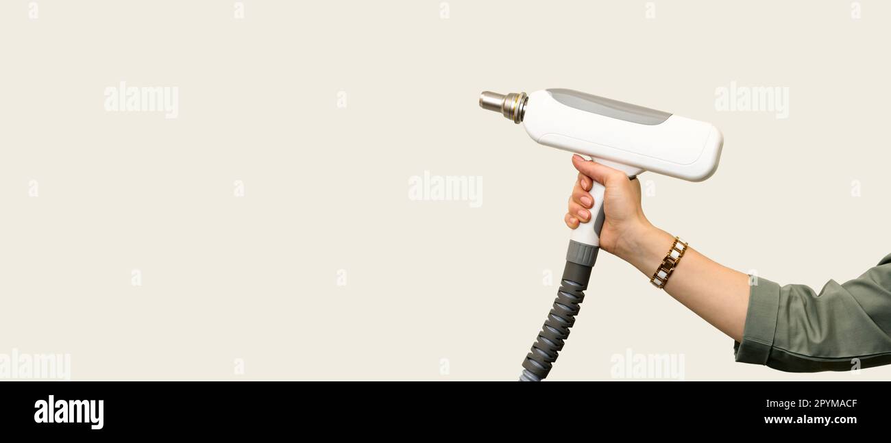 Сosmetologist holds hands maniple for carbon peeling and tattoo or ...