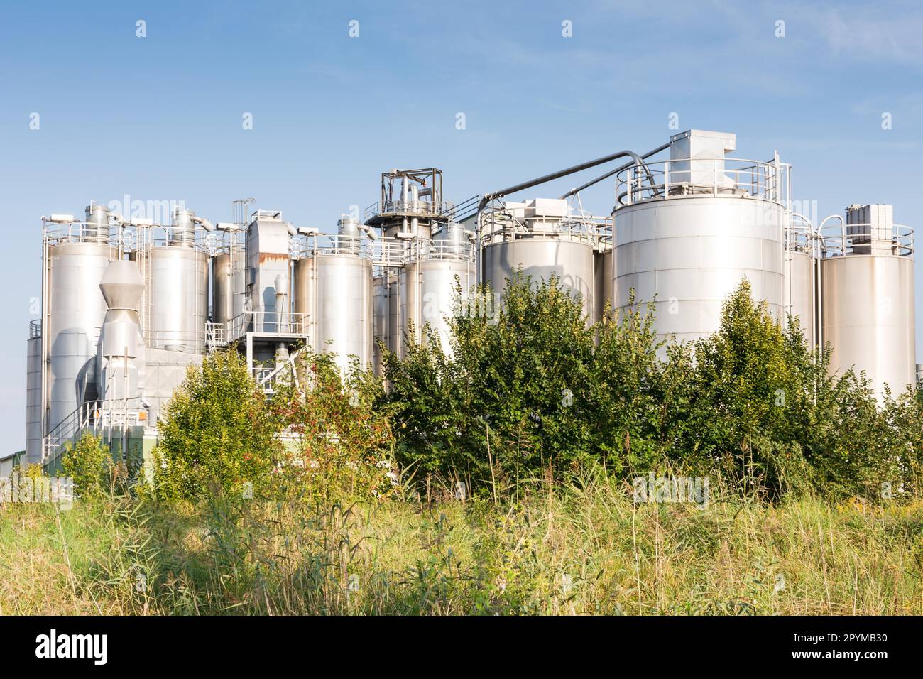 Storage tanks of a chemical plant Stock Photo - Alamy