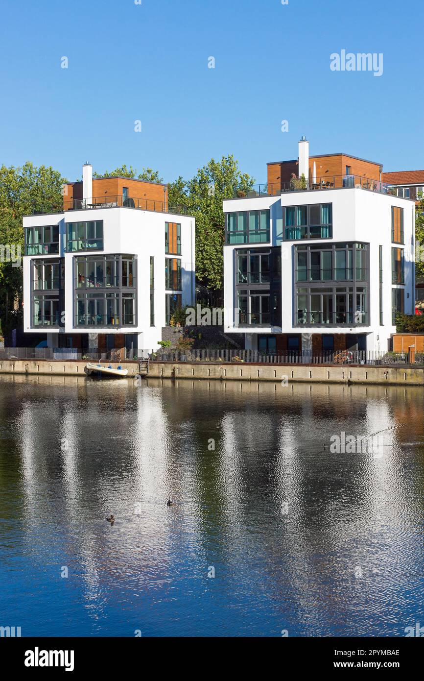 Modern detached houses on the waterfront, seen in Hamburg Stock Photo ...