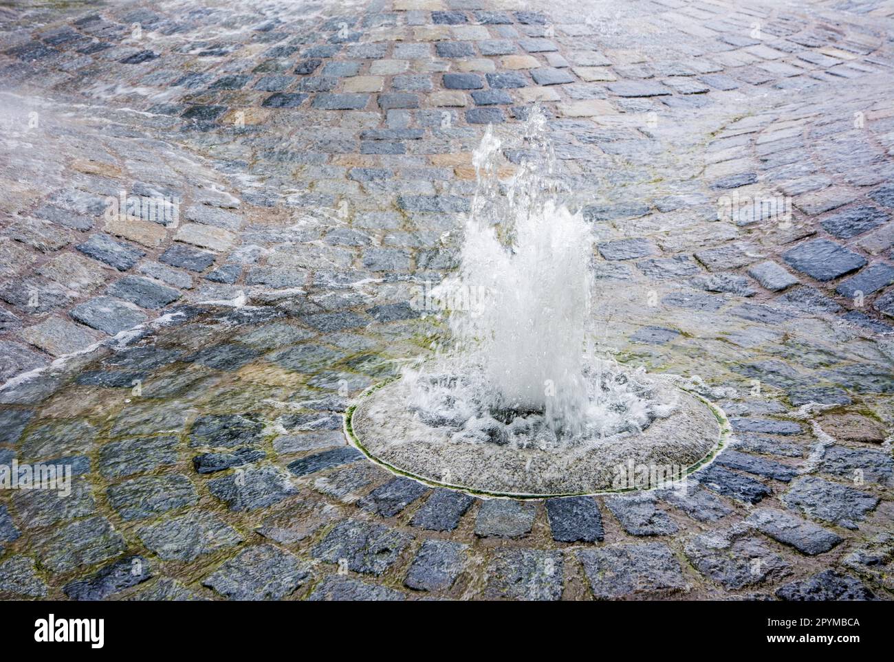 Water splashing ot of a waterspout fountain Stock Photo - Alamy