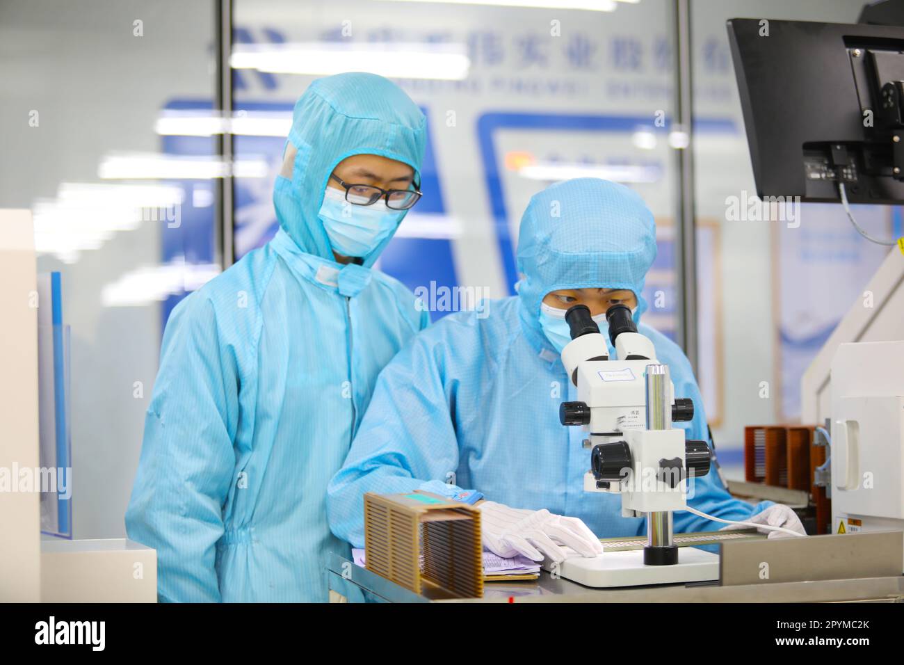 CHONGQING, CHINA - MAY 4, 2023 - Young technicians test the quality of ...