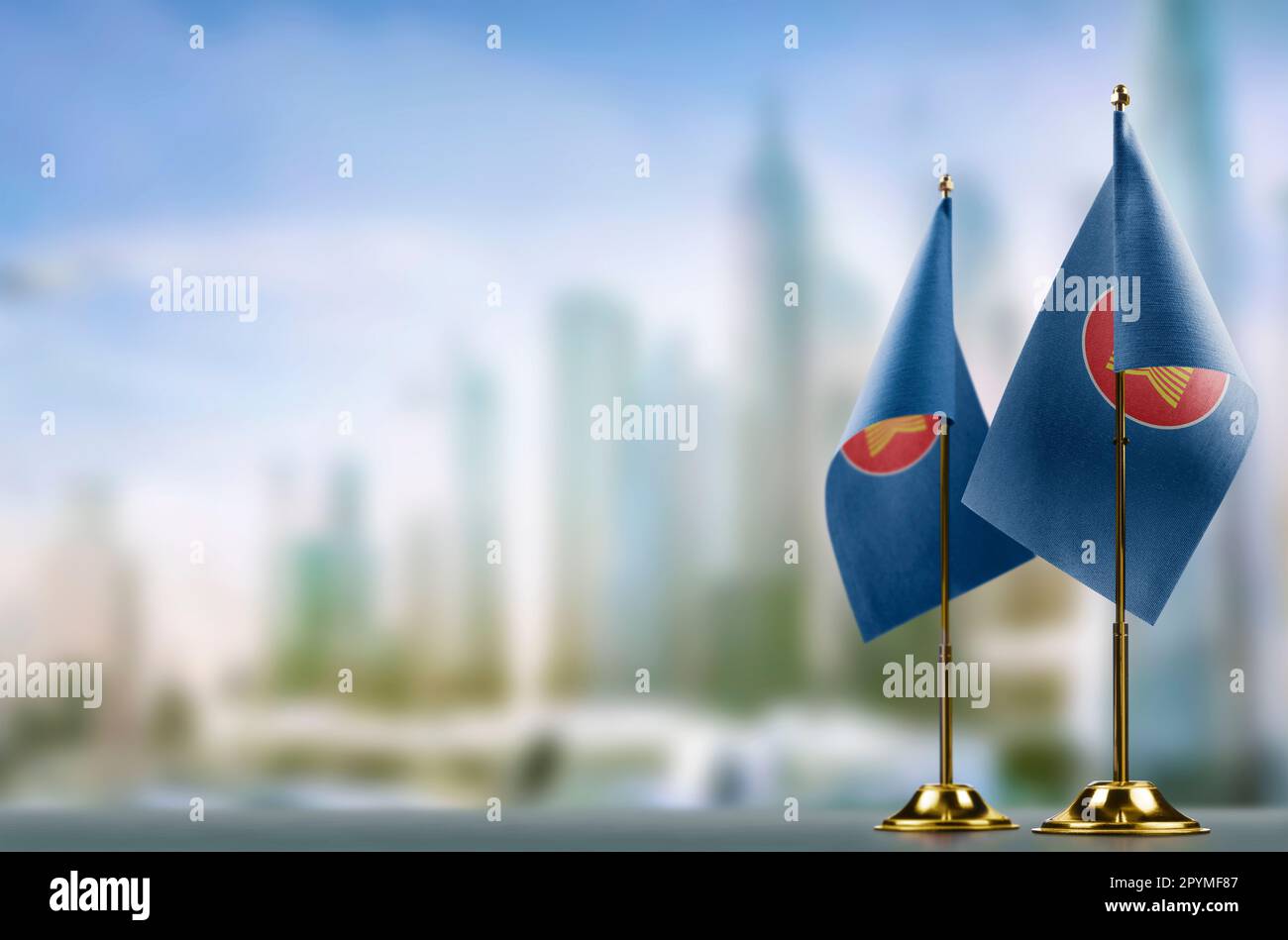 Small flags of the ASEAN on an abstract blurry background Stock Photo ...