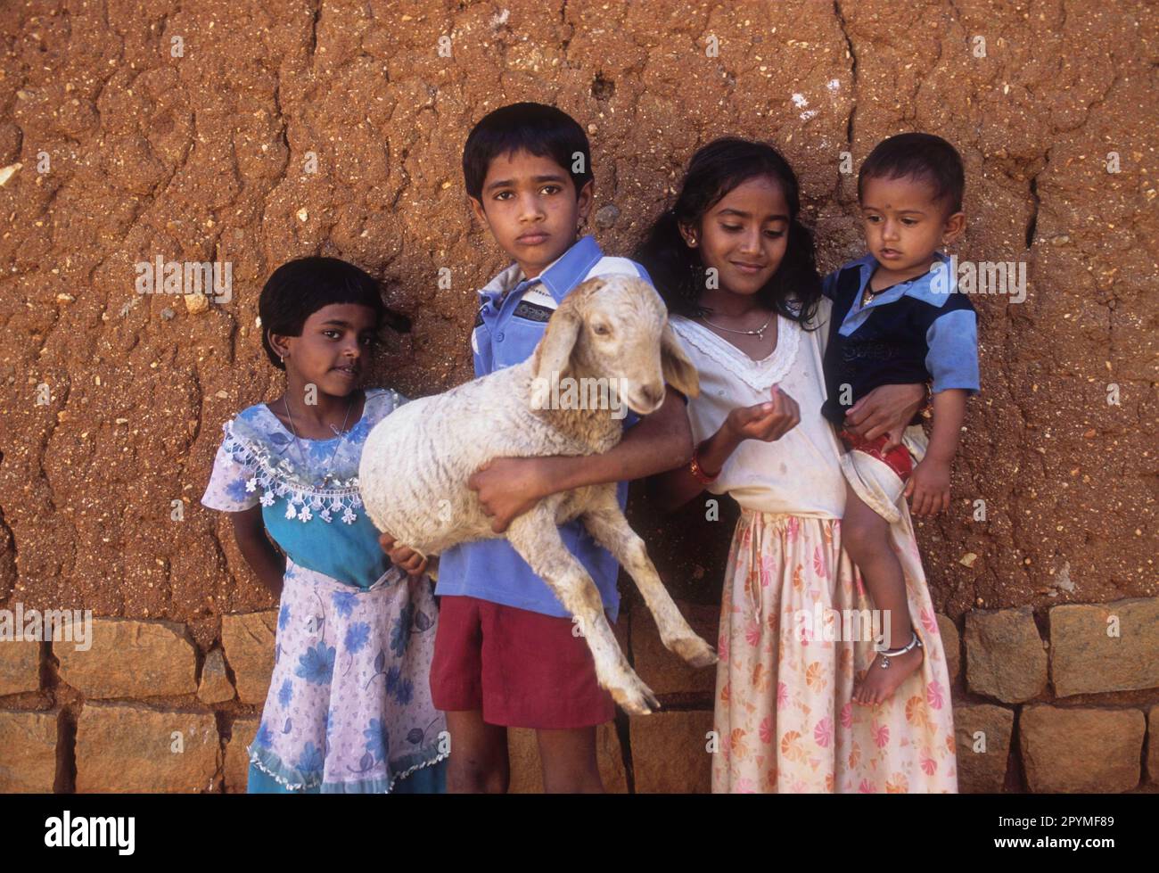 Child lamb hi-res stock photography and images - Alamy