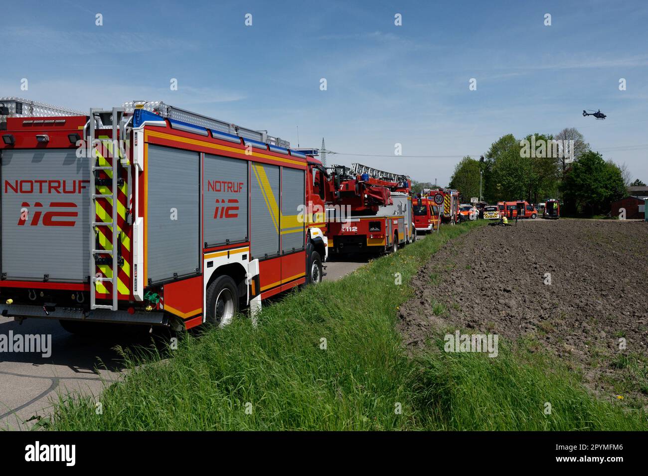04 May 2023, North Rhine-Westphalia, Hürth: Vehicles of the emergency ...