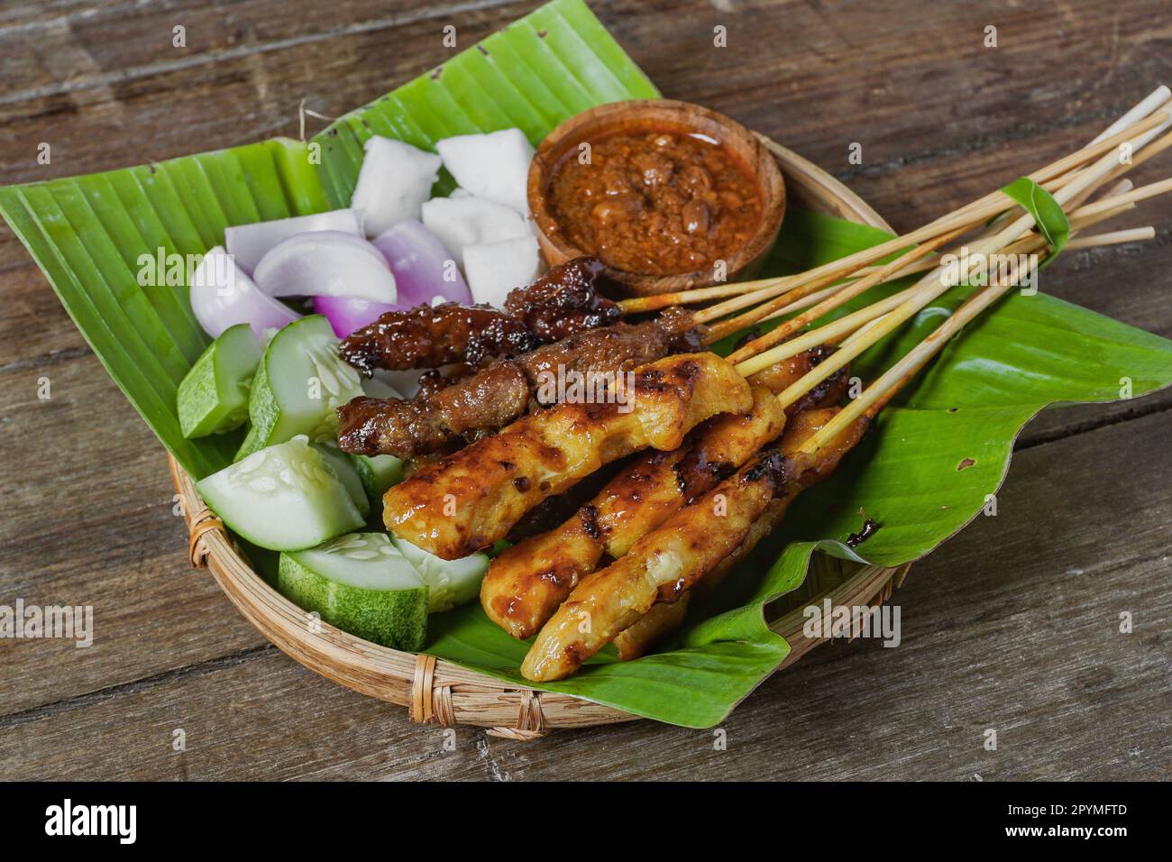 Grilled food chicken and beef satay eaten with peanut sauce is famous ...