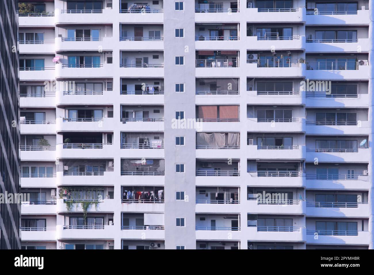 Tall building background, Side of the building with windows and door ...