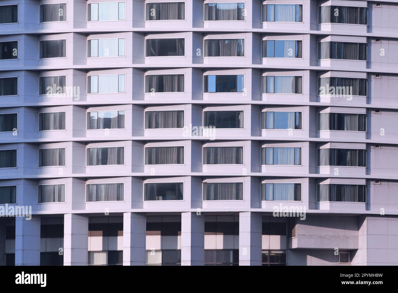 Tall building background, Side of the building with windows and door ...