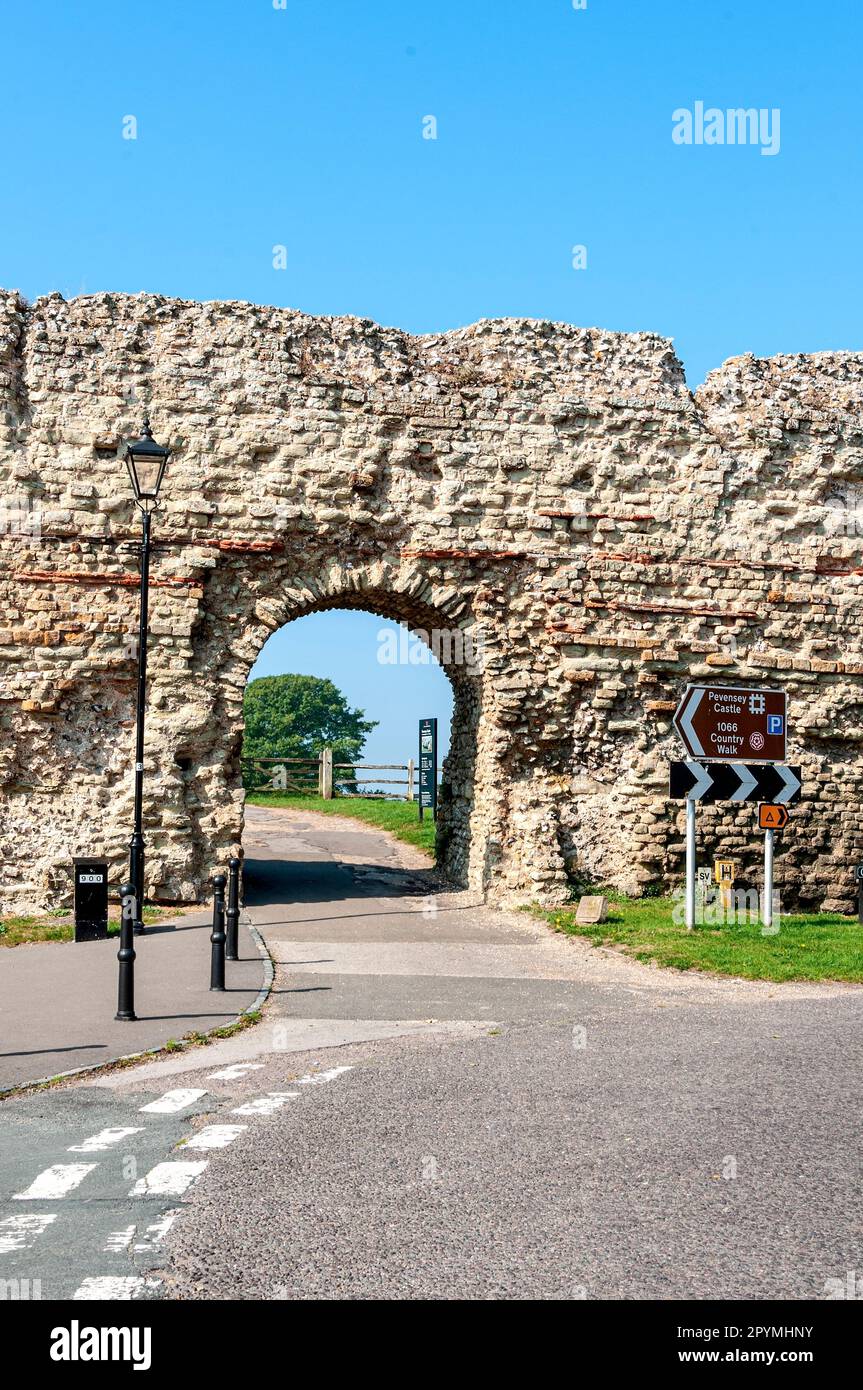 The arched entrance through ancient walls to the Roman Saxon fort of ...