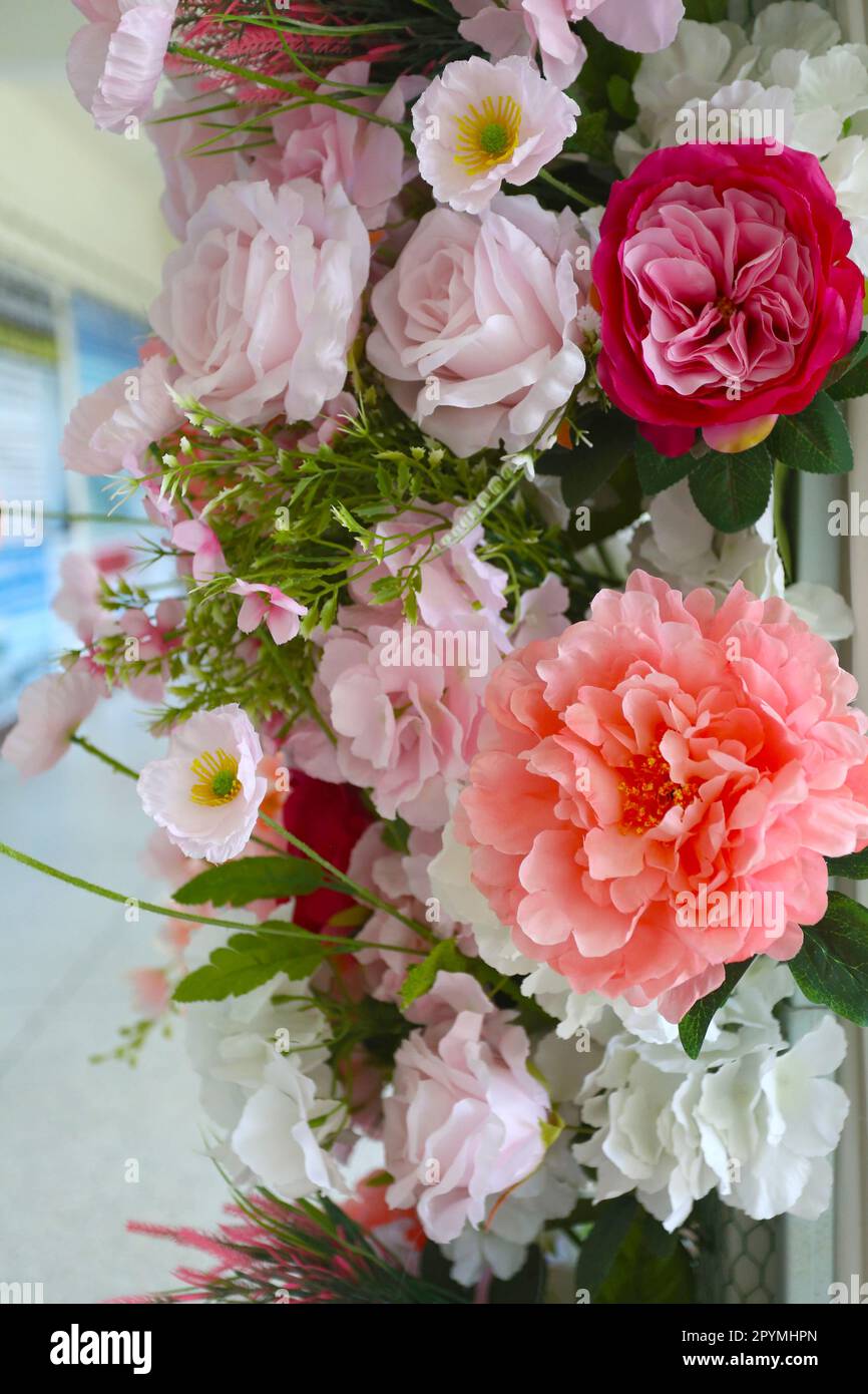 Fake flowers decorate the interior of a hotel, Beautiful colors of fake ...