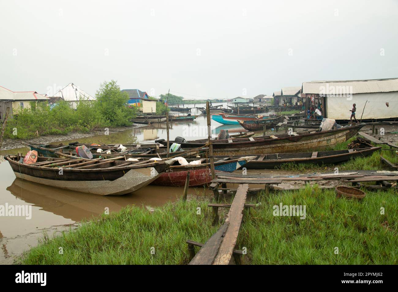 Ondo State, Nigeria - May 2nd, 2023 - A boy walking through the ...