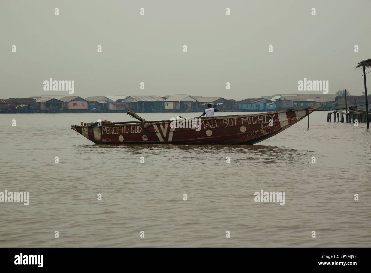 Ondo State, Nigeria - May 2nd, 2023 - A fisherman fishing at the center ...