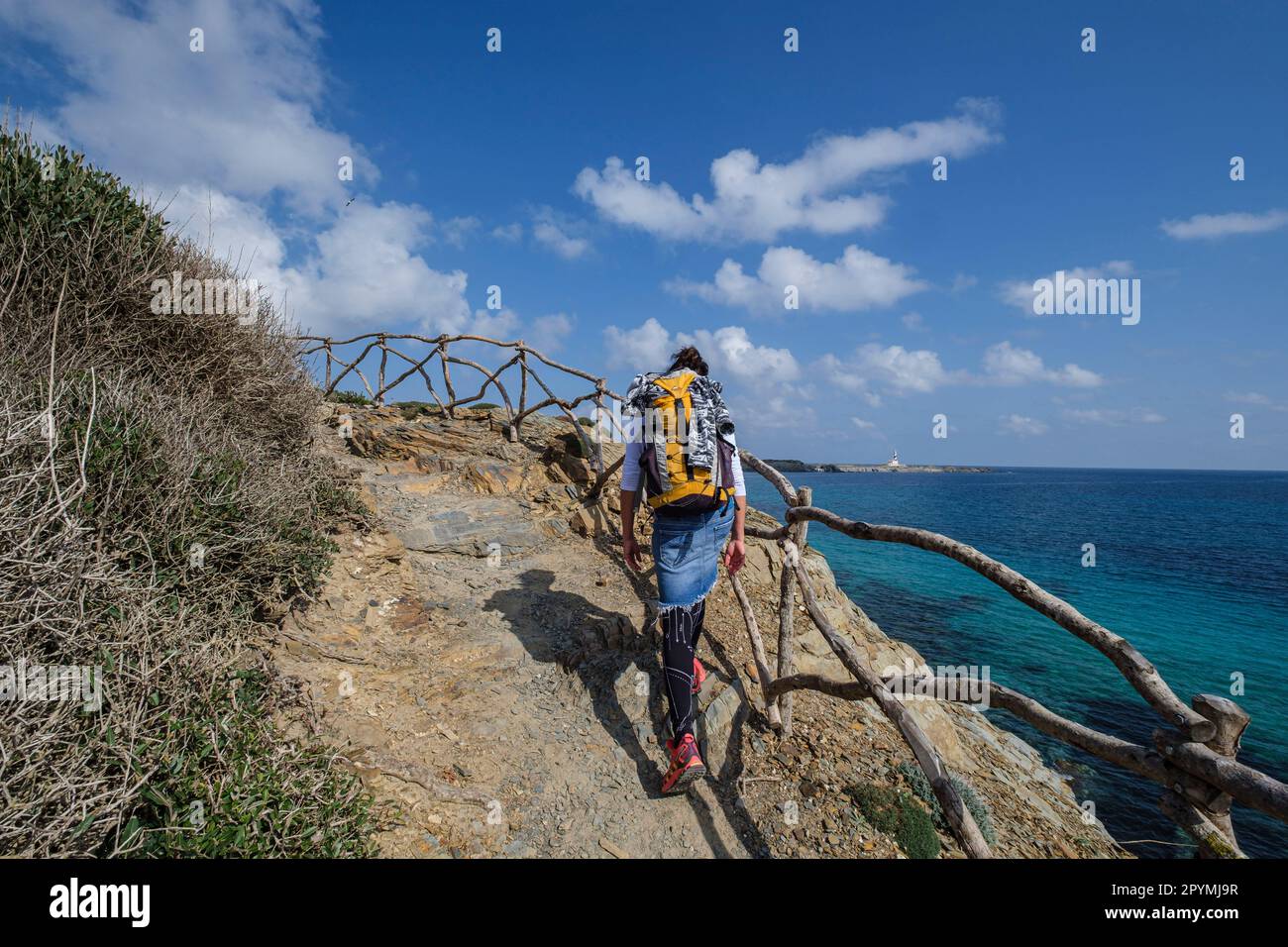 hiker walking the horse path, - Cami de Cavalls-,s'Albufera des Grau ...