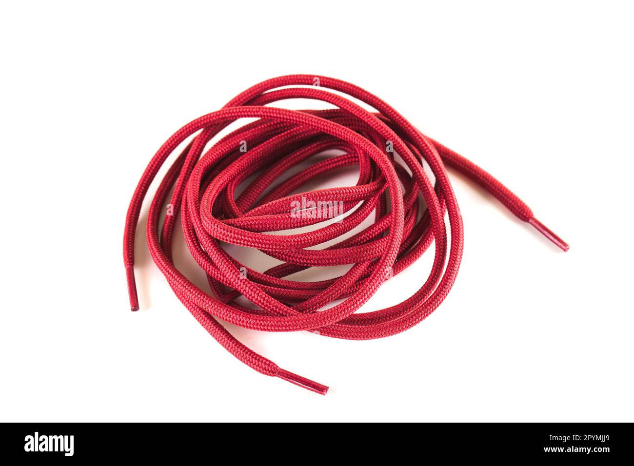 red shoe laces against white background Stock Photo - Alamy