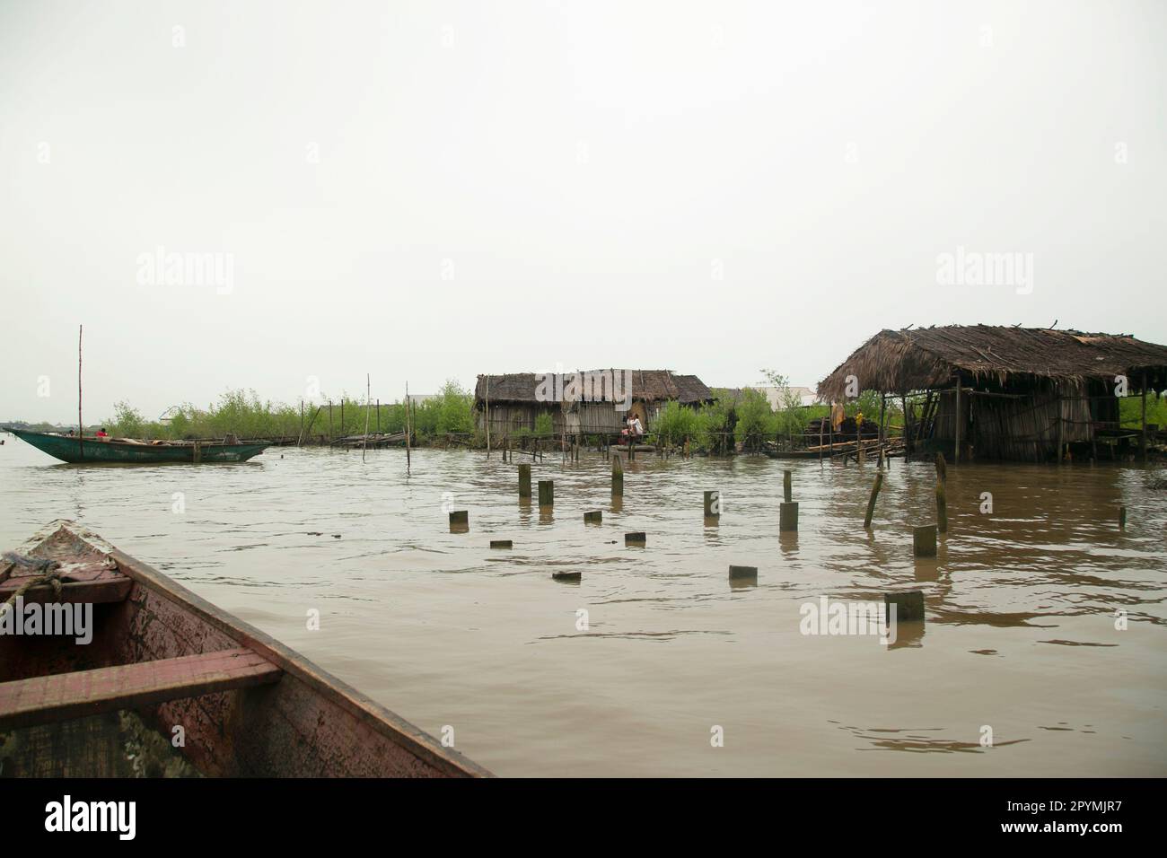 Ondo State, Nigeria - May 2nd, 2023 - Women sitting in front of their ...