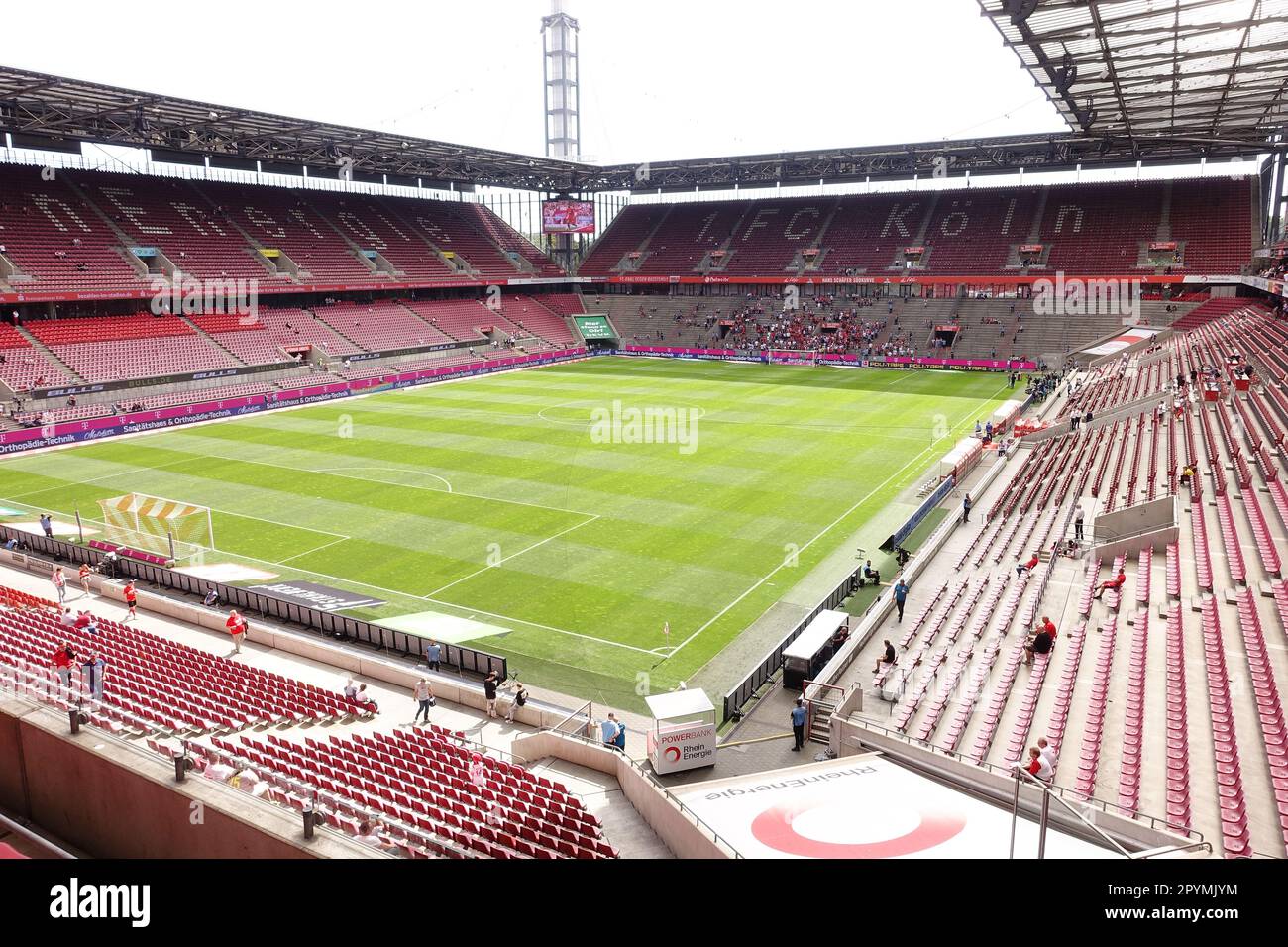 A vibrant soccer stadium filled with a small crowd Stock Photo - Alamy