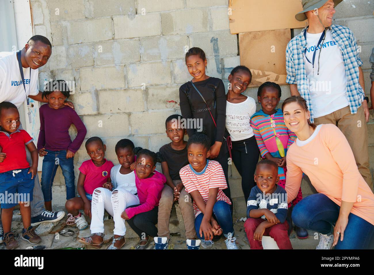 Spending time with the kids in the community. Portrait of kids at a ...