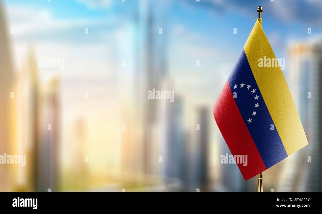 Small flags of the Venezuela on an abstract blurry background Stock ...