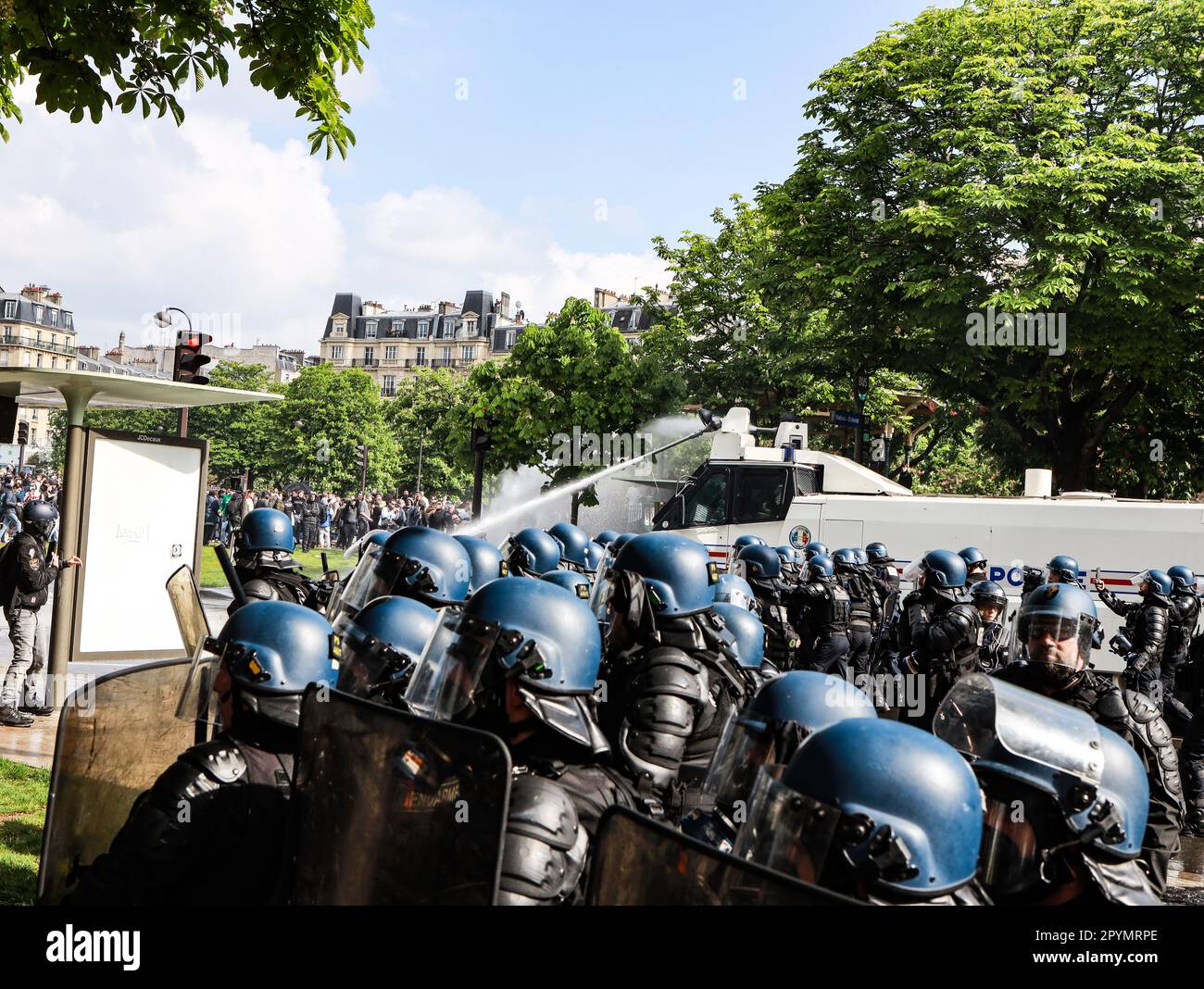 French police forces seen on guard as they clash with demonstrators in ...
