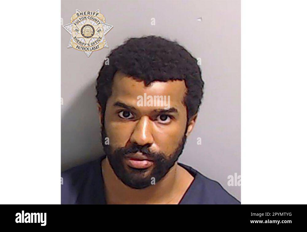 This booking photo provided by Fulton County Sheriff’s Office shows ...