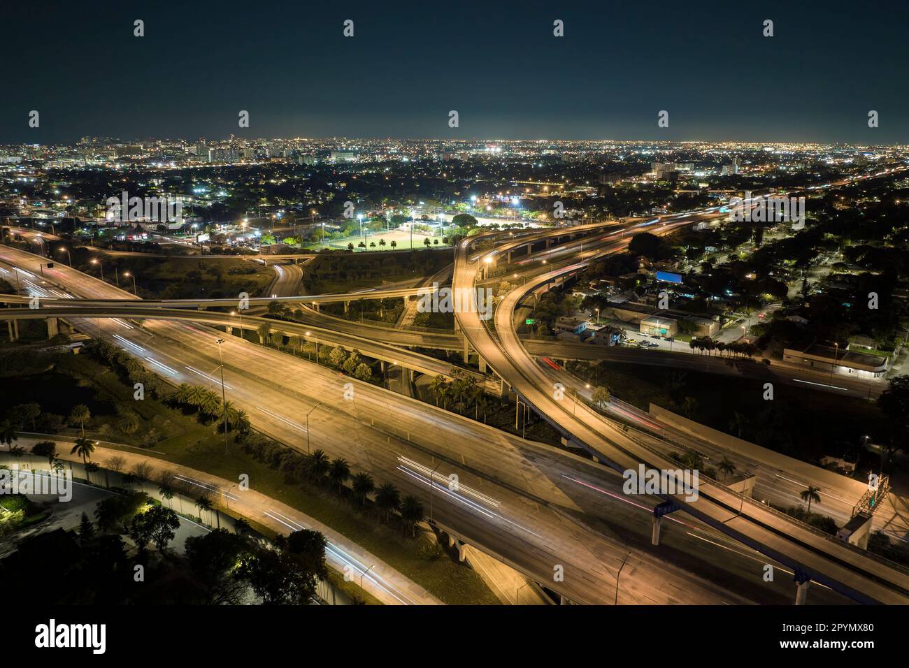 Above view of wide highway crossroads in Miami, Florida at night with ...