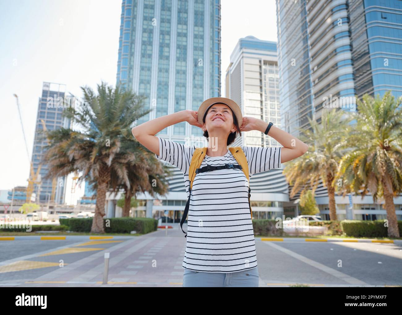 travel to the United Arab Emirates, Happy young asian female traveler ...