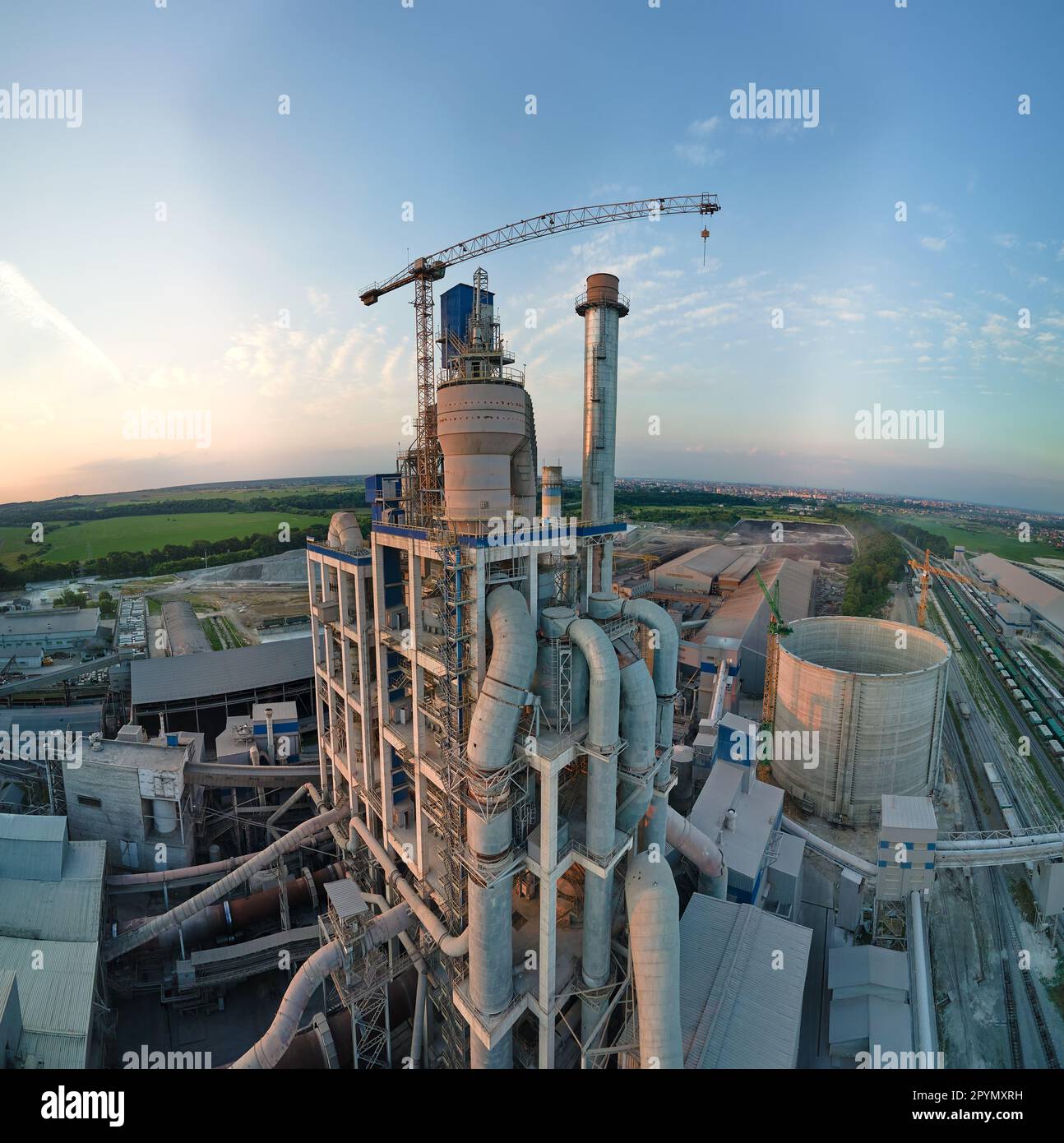 Aerial view of cement factory with high concrete plant structure and ...