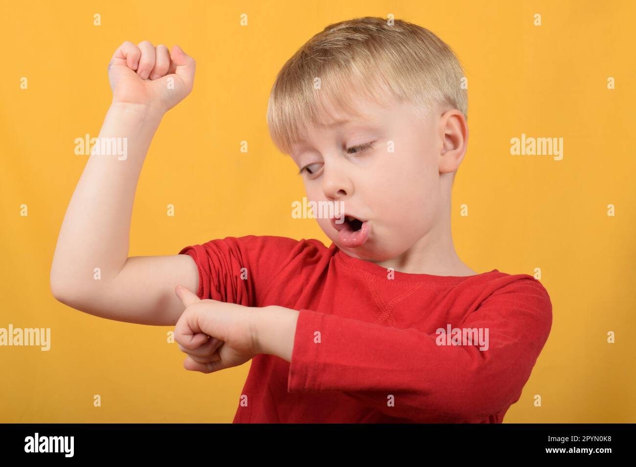 funny boy child shows his muscles Stock Photo - Alamy