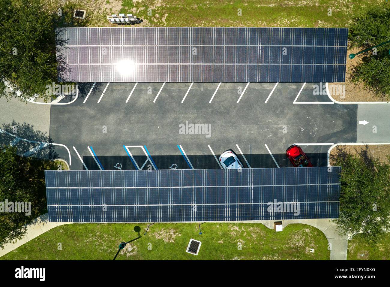 Aerial view of solar panels installed as shade roof over parking lot ...