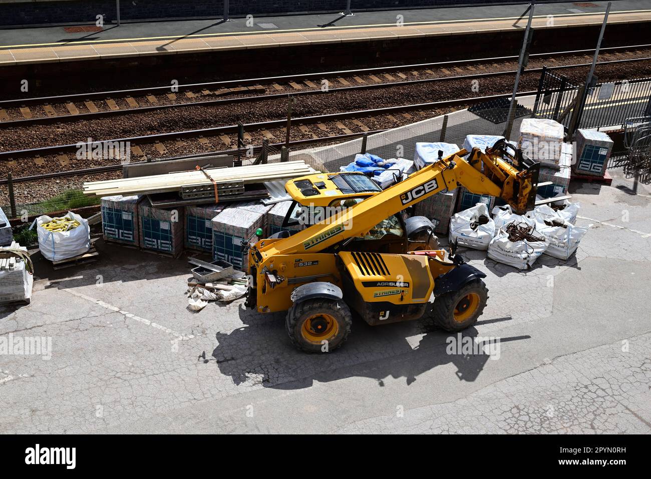 A JCB forklift in action in the builders compound at Dawlish railway ...