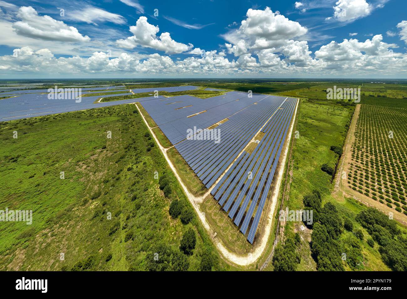 Aerial view of sustainable electric power plant between agricultural ...