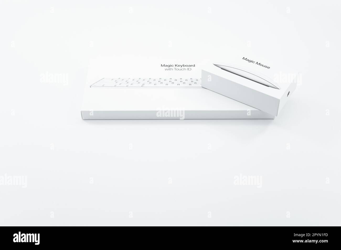 image with Apple Magic mouse and Magic keyboard boxes on a white table ...