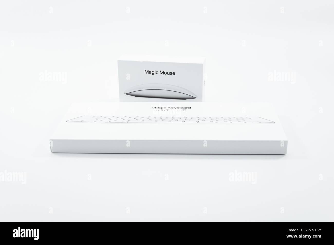 image with Apple Magic mouse and Magic keyboard boxes on a white table ...